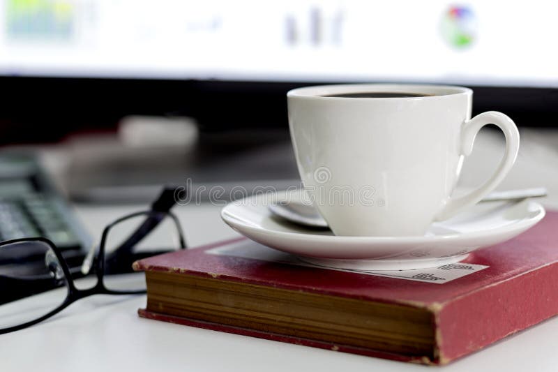 A Cup of Coffee ,glasses and Computer Screen on Desk. Stock Photo ...