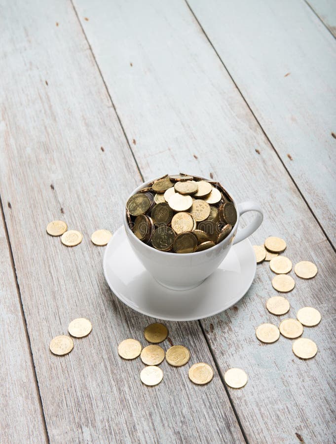 Cup of Coffee with Gold Coins Stock Photo - Image of gratuities ...