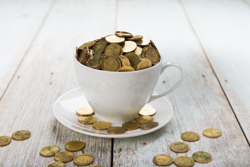 Cup of Coffee with Gold Coins Stock Image - Image of consumer, nickels ...