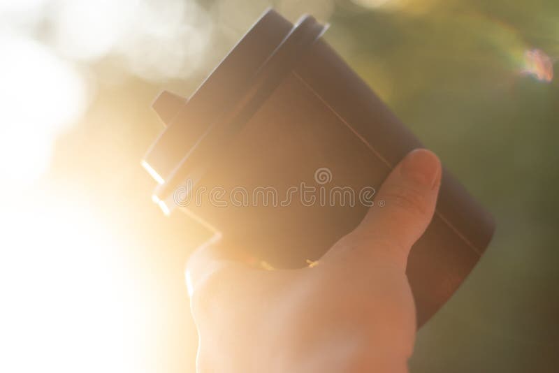 A Cup of Coffee in Hand. Coffee in Hand. Coffee in Nature Stock Image ...