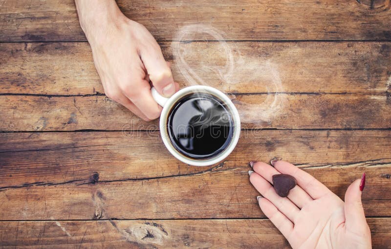 A Cup of Coffee in the Hands of Lovers. Stock Image - Image of ...