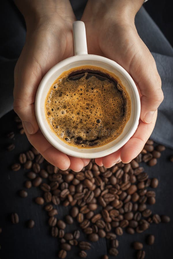 Cup of Coffee in the Hands Vertical Stock Image - Image of hands ...