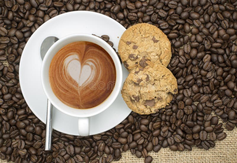 Cup of Coffee with Heart Shape in Foam on Hessian Background Stock ...