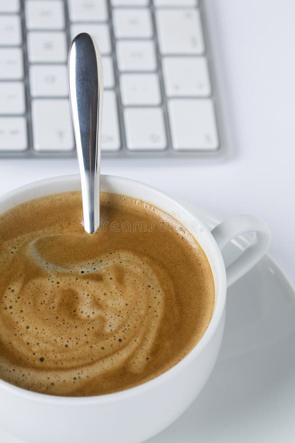 Cup of Coffee, Keyboard and Desktop Computer on Desk in White Home ...