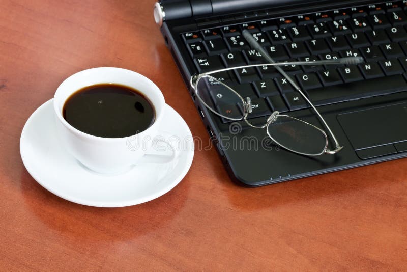 Cup of Coffee with a Laptop and Glasses Stock Photo - Image of internet ...