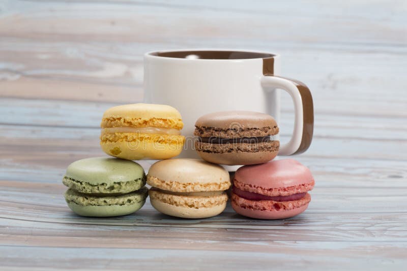 Cup coffee and macarons stock photo. Image of sandwich - 240386088