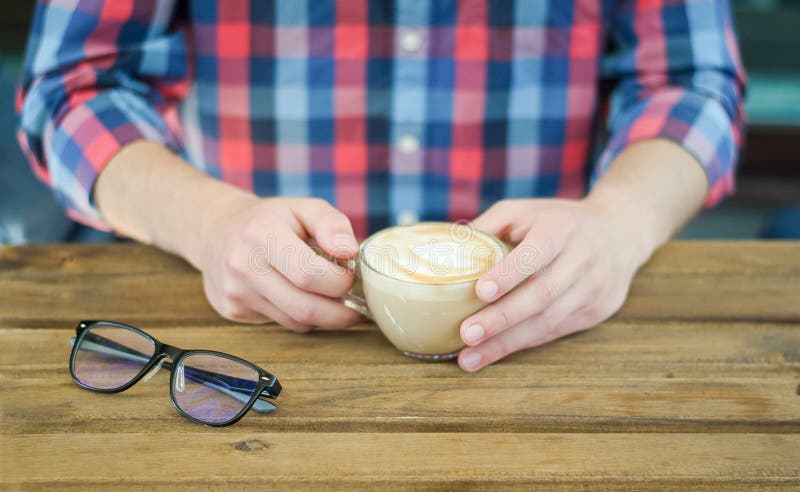 A Cup of Coffee in Men`s Hands Stock Image - Image of holding, overhand ...