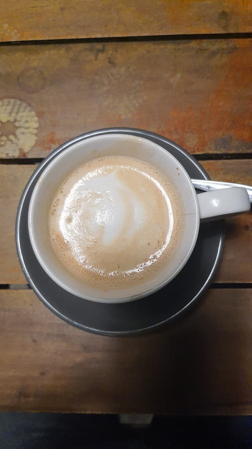 A cup of coffee milk stock photo. Image of dairy, produce - 227010856