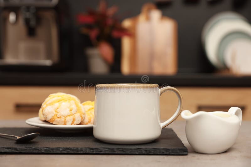 Cup of Coffee, Milk and Cookies on Table in Kitchen Stock Photo - Image ...