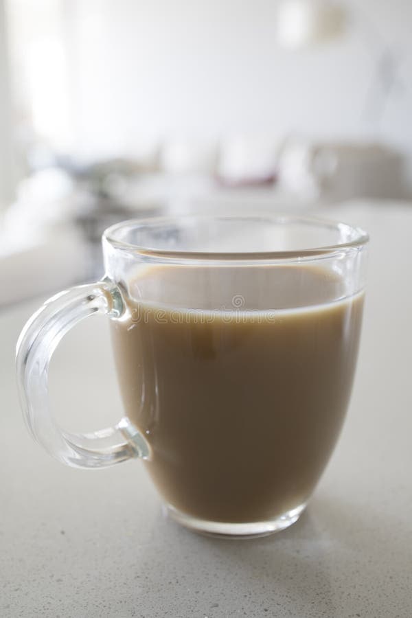 A Cup of Coffee with Milk stock photo. Image of white - 182647390