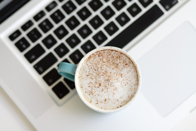Laptop with coffee cup stock image. Image of desk, button - 24900891