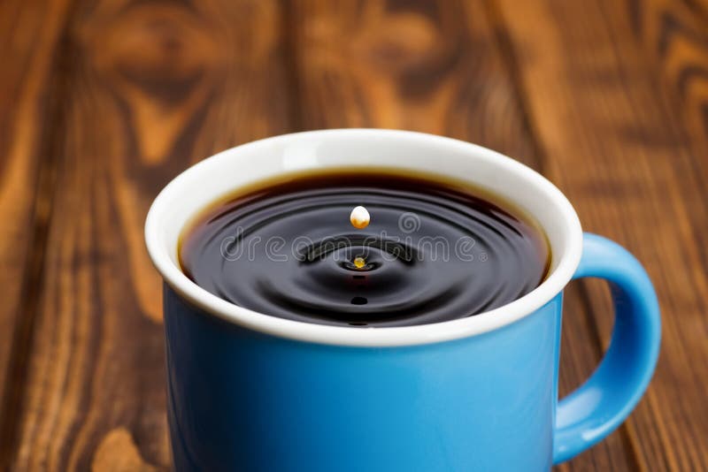 Cup with coffee and milk stock photo. Image of wooden - 218225630