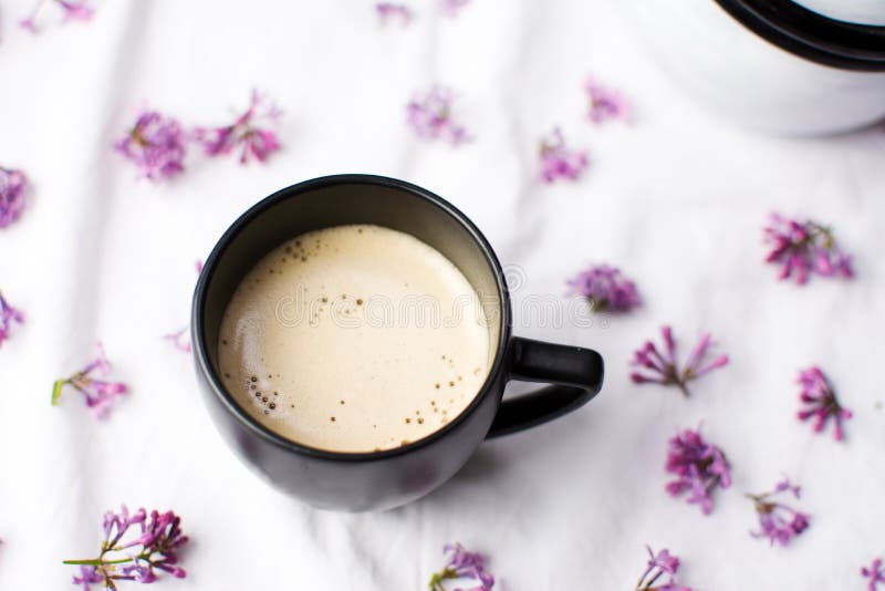 Cup of Coffee with Milk on a Table Stock Image - Image of sheets ...