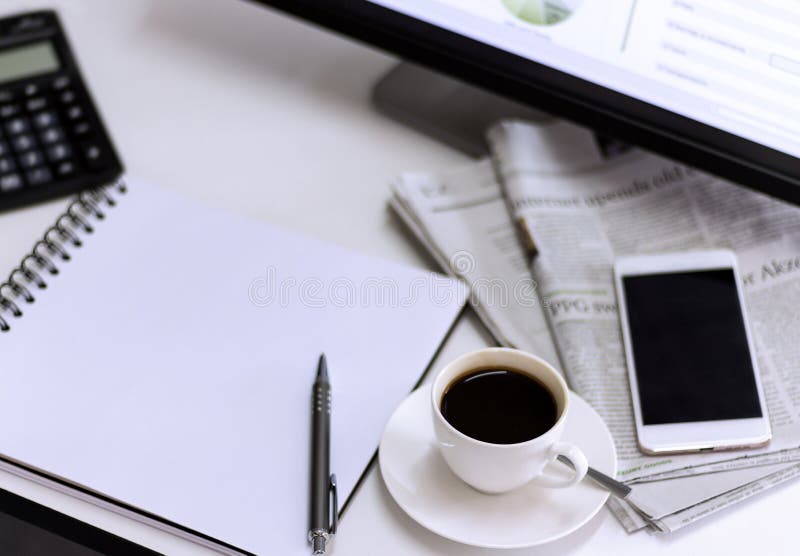 Cup of Coffee with Newspaper,computer and Smartphone on White Ta Stock ...