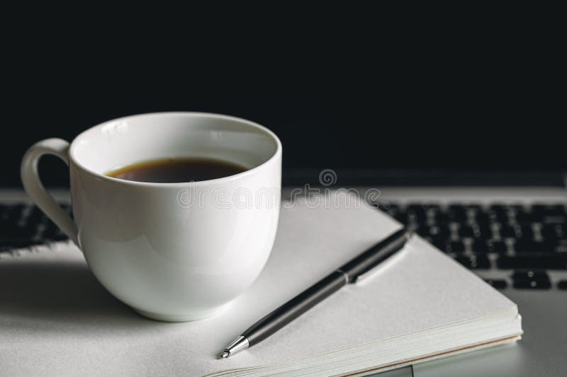 Cup of Coffee, Notepad and Laptop, Office Work Concept. Stock Photo ...