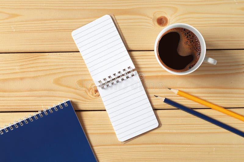 Cup of coffee and notepad stock photo. Image of drink - 73745950