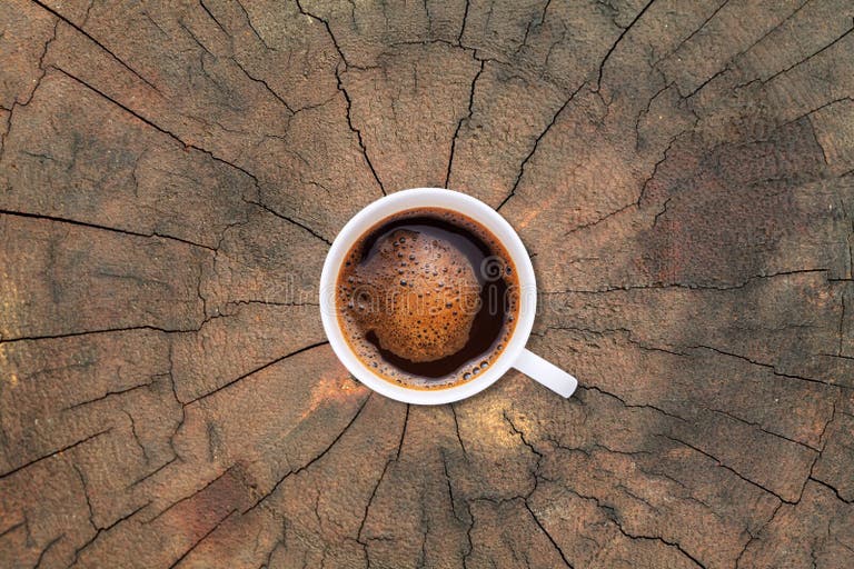 A Cup of Coffee on Old Tree Stump Texture Background Stock Image ...