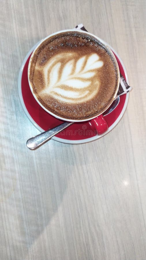 A Cup of Coffee with Palm Sugar in a Red Cup Stock Photo - Image of ...