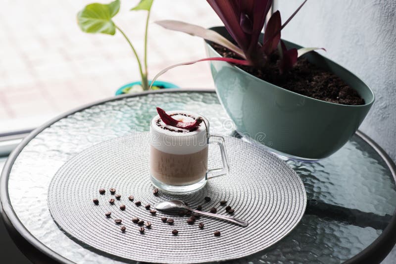 Cup of Coffee with Pepper on the Coffee Table in the Cafeteria. Stock ...