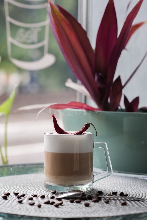 Cup of Coffee with Pepper on the Coffee Table in the Cafeteria. Stock ...
