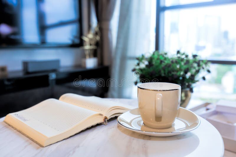Cup of Coffee and Record Books on Table Stock Photo - Image of weekend ...