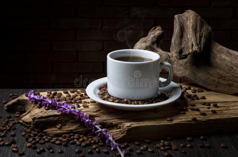 Cup of Coffee on a Rustic Wood. Coffee Grains Stock Photo - Image of ...