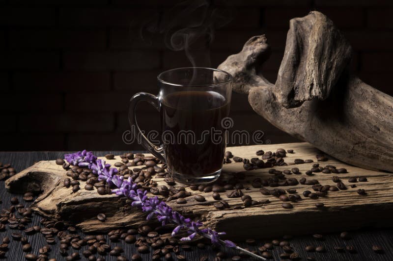 Cup of Coffee on a Rustic Wood. Coffee Grains Stock Image - Image of ...