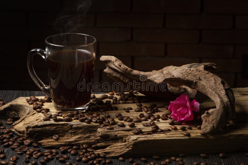 Cup of Coffee on a Rustic Wood. Coffee Grains Stock Photo - Image of ...