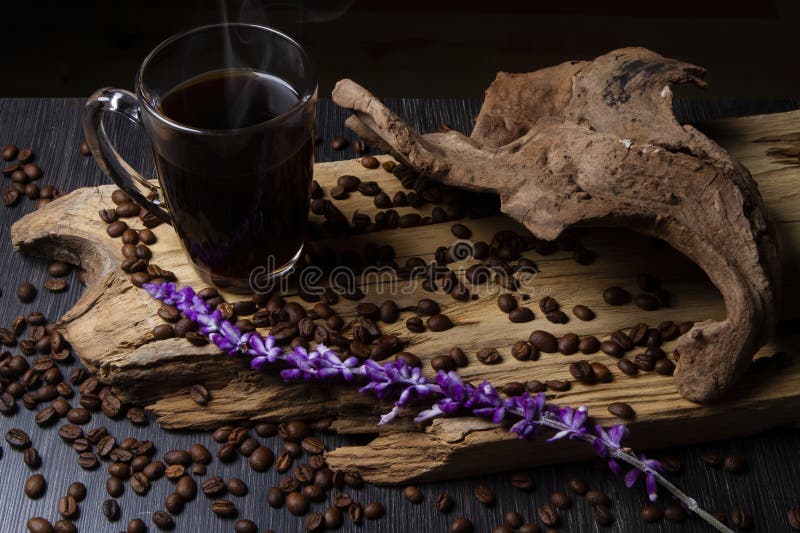 Cup of Coffee on a Rustic Wood. Coffee Grains Stock Photo - Image of ...