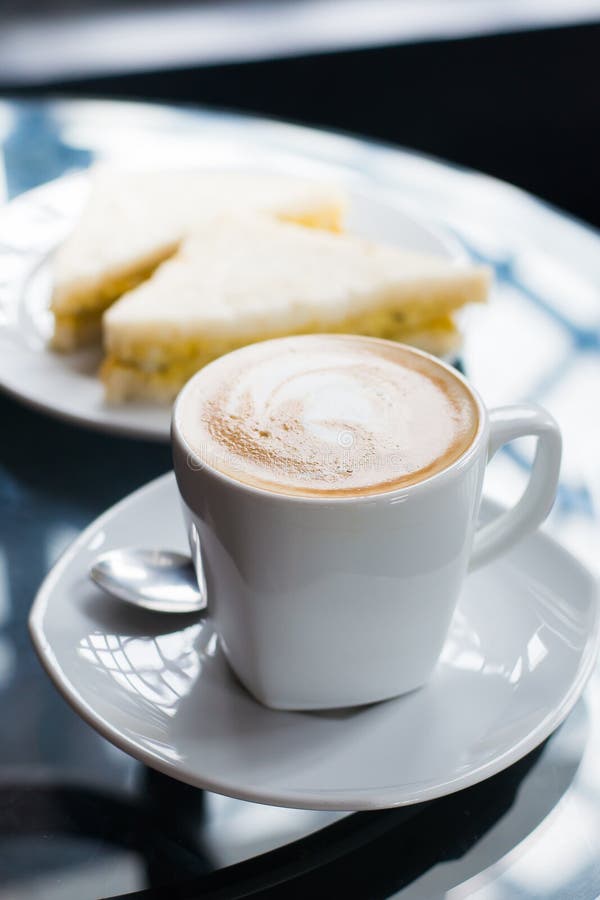 Cup of coffee and sandwich stock photo. Image of caffeine - 44360588