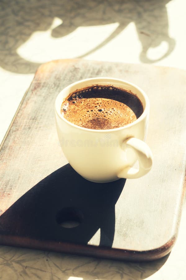 A Cup of Coffee and the Shadow of the Teapot Stock Image - Image of ...