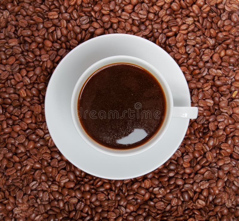 Cup of coffee beans stock image. Image of caffeine, liquid - 10166643