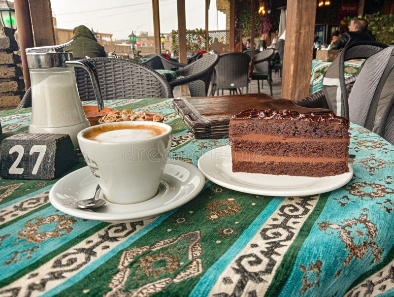 A Cup of Coffee and a Slice of Cake in a Cafe in Erbil, Iraq Editorial ...