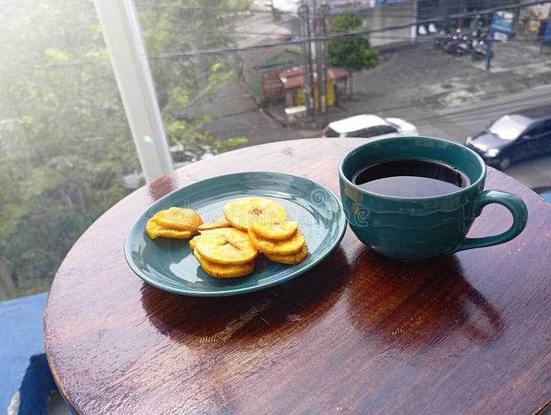 A Cup of Coffee and a Snack in a Tall Building Stock Image - Image of ...