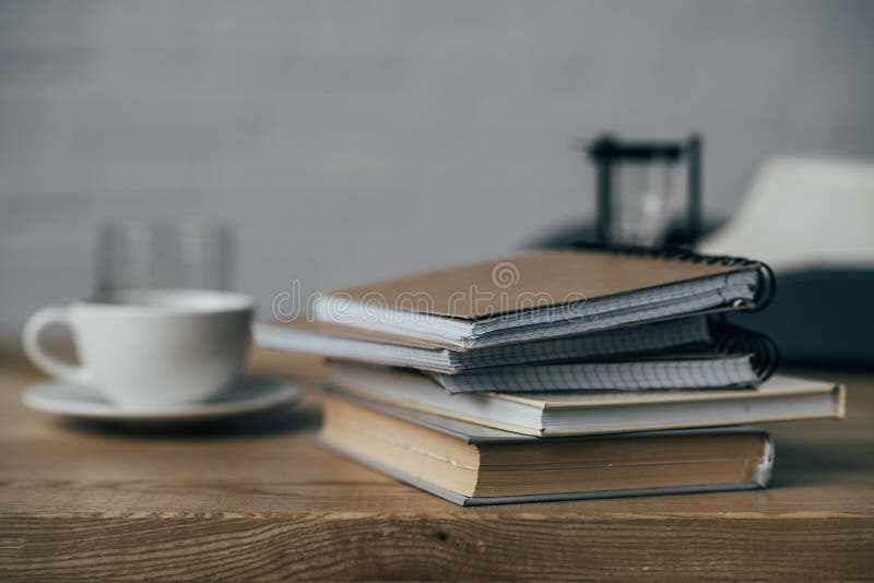 Cup of Coffee and Stack of Notebooks Stock Photo - Image of beverage ...