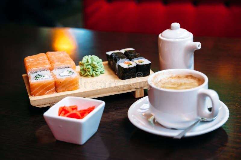 Cup Coffee and Sushi on Table Stock Image - Image of espresso, meal ...