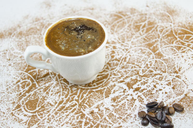 Cup of Coffee on a Table Covered with Coffee Grains Stock Image - Image ...