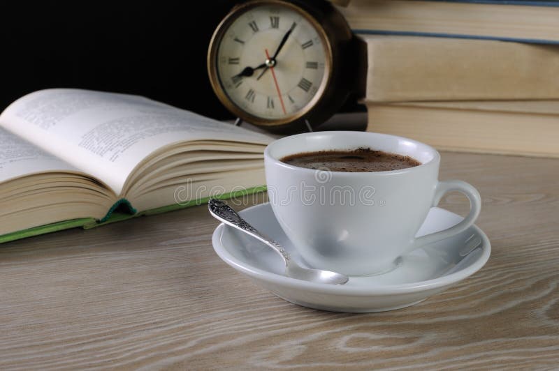 Cup of Coffee at a Table in the Library Stock Photo - Image of ...