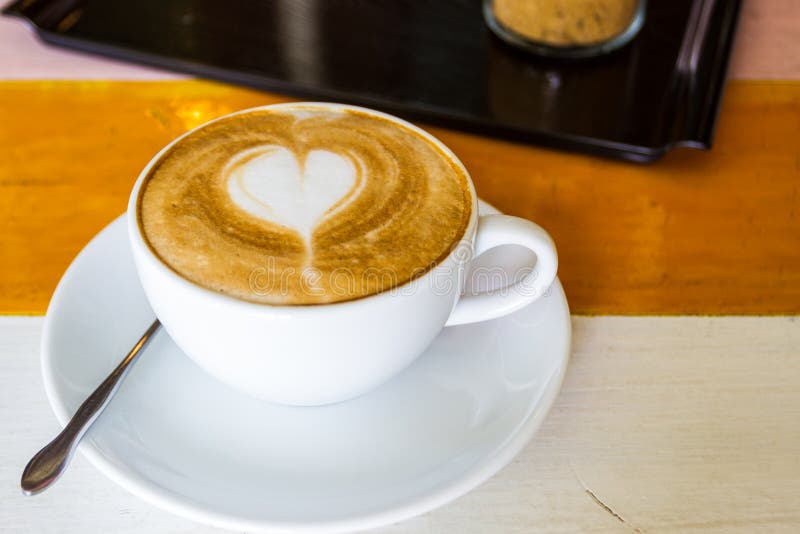 Cup of coffee on table stock image. Image of decaf, beans - 34379533