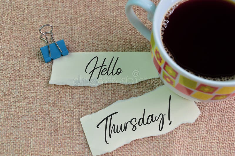 A Cup of Coffee and Torn Paper with Text HELLO THURSDAY Stock Photo ...