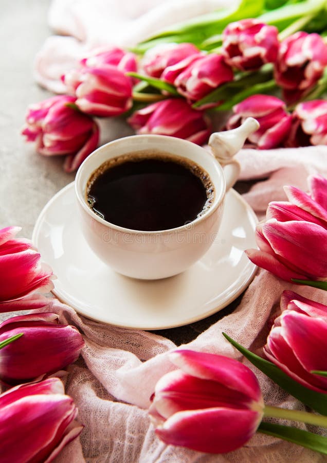 Cup of coffee and tulips stock image. Image of beautiful - 141736819