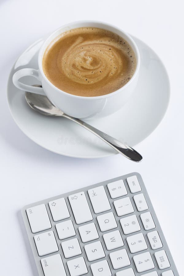 Cup of Coffee in a White Cup on a White Plate Stock Image - Image of ...