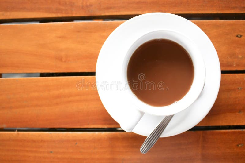 A Cup of Coffee on Wood Table Stock Image - Image of dish, drink: 32228937