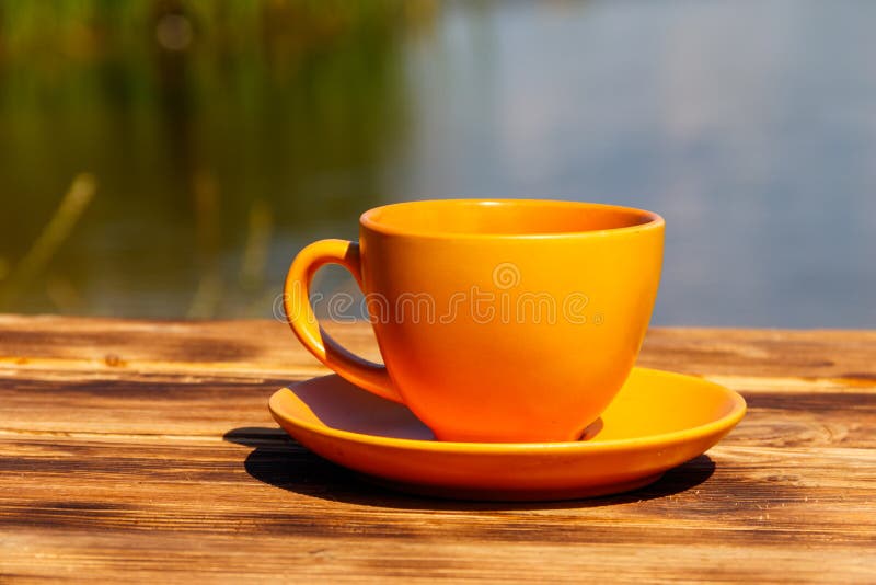 Cup of Coffee on a Wooden Table Near the River Stock Image - Image of ...