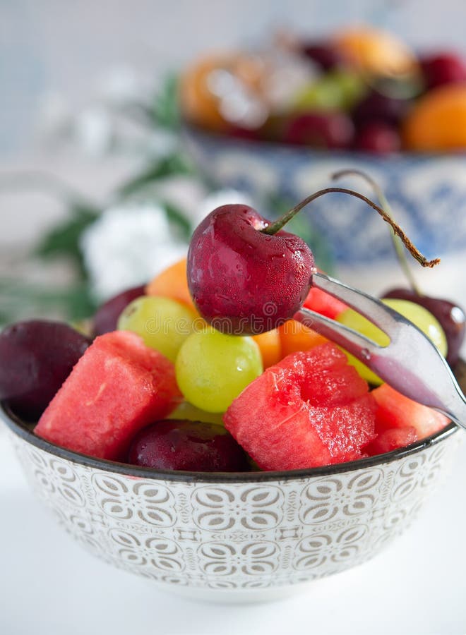 Cup with Cold Water and Fresh Summer Fruit with Ice Stock Photo - Image ...