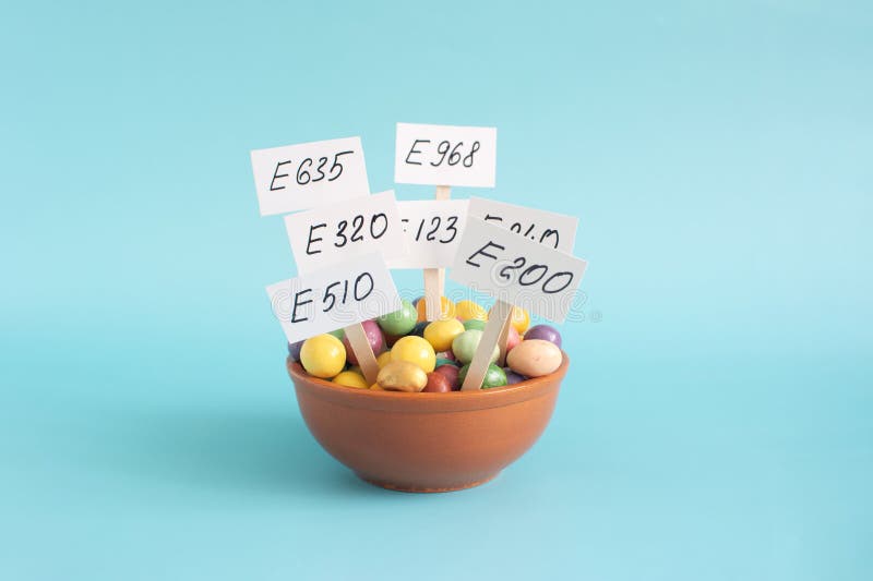 A Cup with Colored Food Additives in the Form of Granules and ...