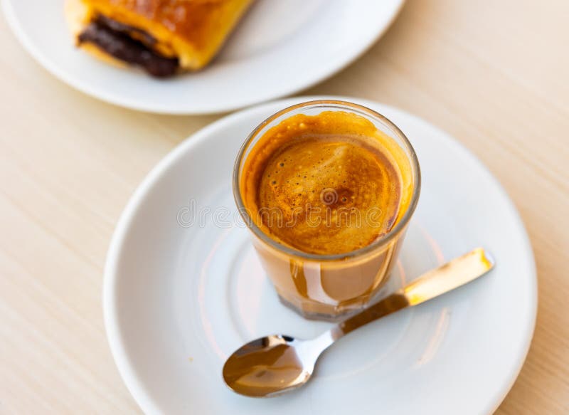 Cup of Cortado, Spanish Beverage Made of Espresso with Dessert Stock ...