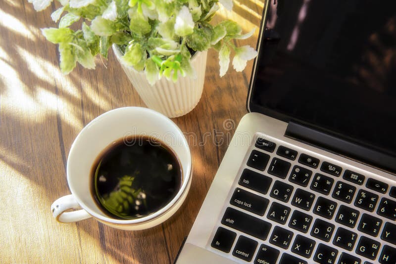 A Cup of Espresso Coffee with Computer Notebook Stock Photo - Image of ...