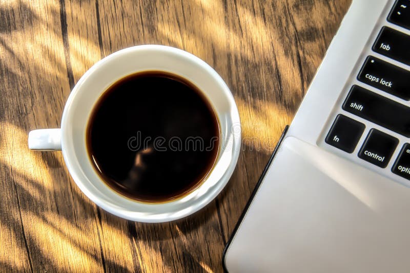 A Cup of Espresso Coffee with Computer Notebook Stock Photo - Image of ...
