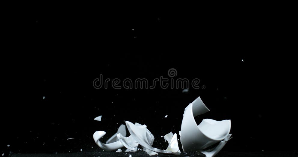 Cup Falling and Exploding on Black Background Stock Image - Image of ...